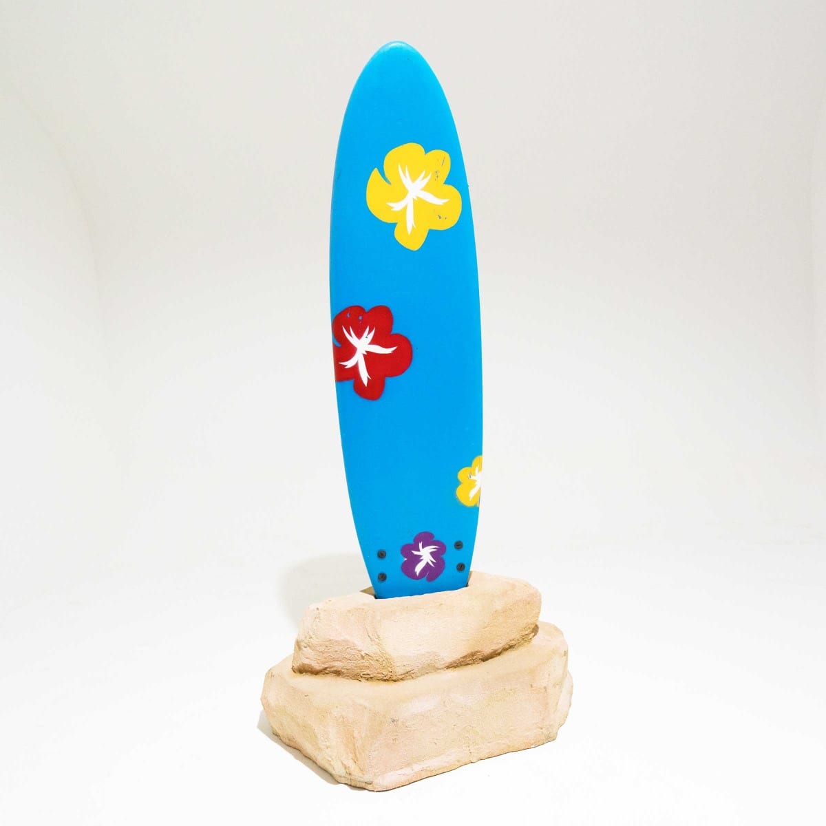 Surfboard in Rock